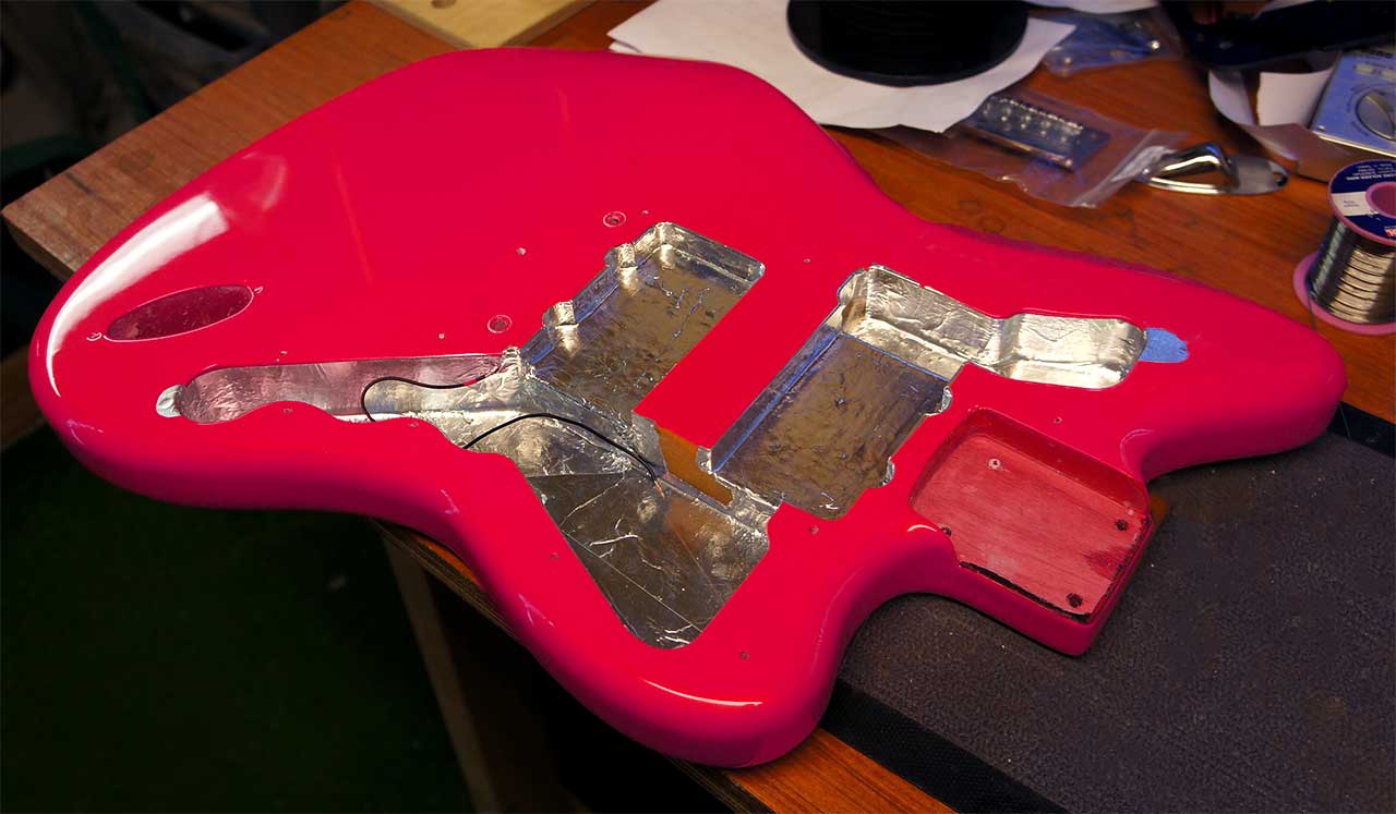 Why Shield the Cavities of Electric Guitars?